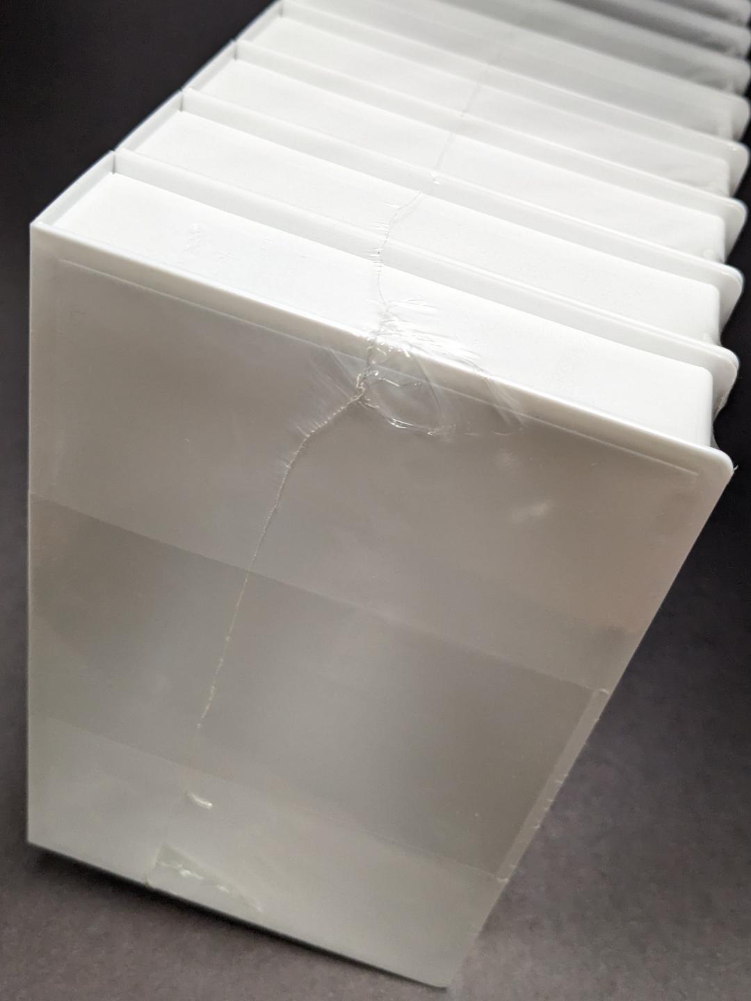 VHS Plastic Case white with 1/3 Sleeve – DELTAMEDIA INTL INC